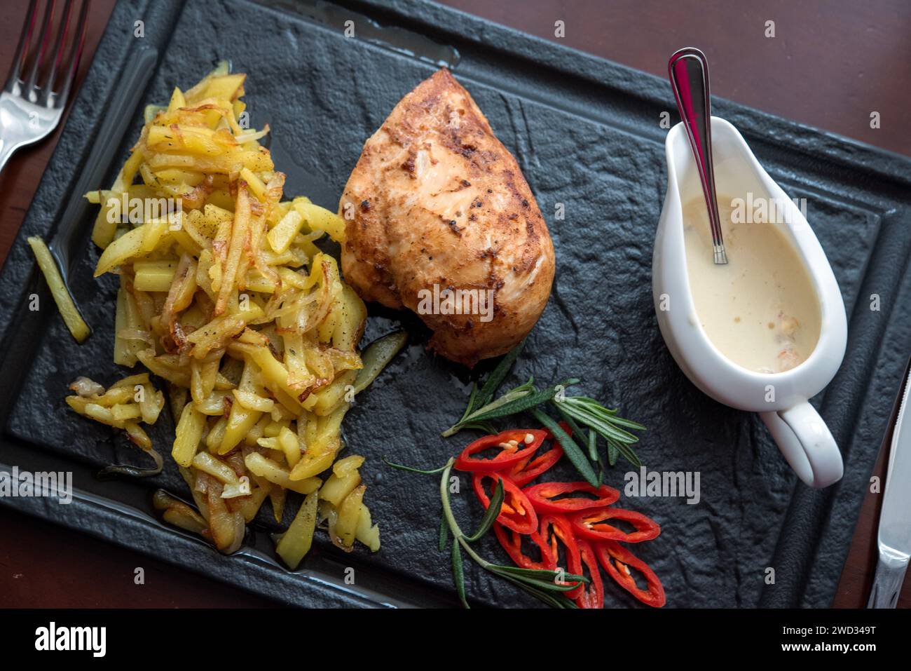 Chicken Recipe Plated in a Restaurant Stock Photo - Alamy
