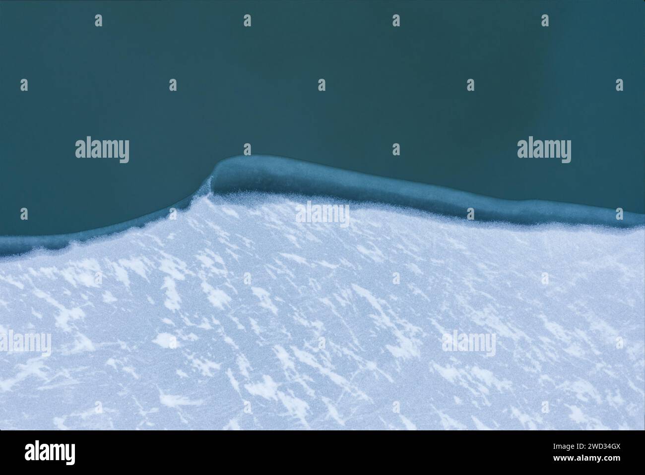Winter background. of frozen lake ice texture with snow from aerial ...