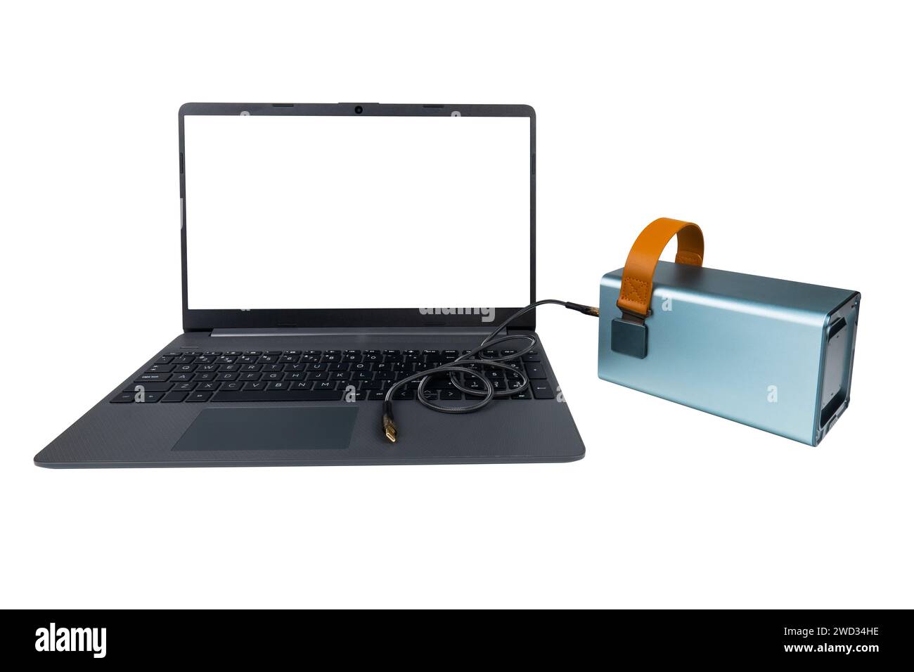 Laptop with a blank white screen next to a large power bank (charging ...