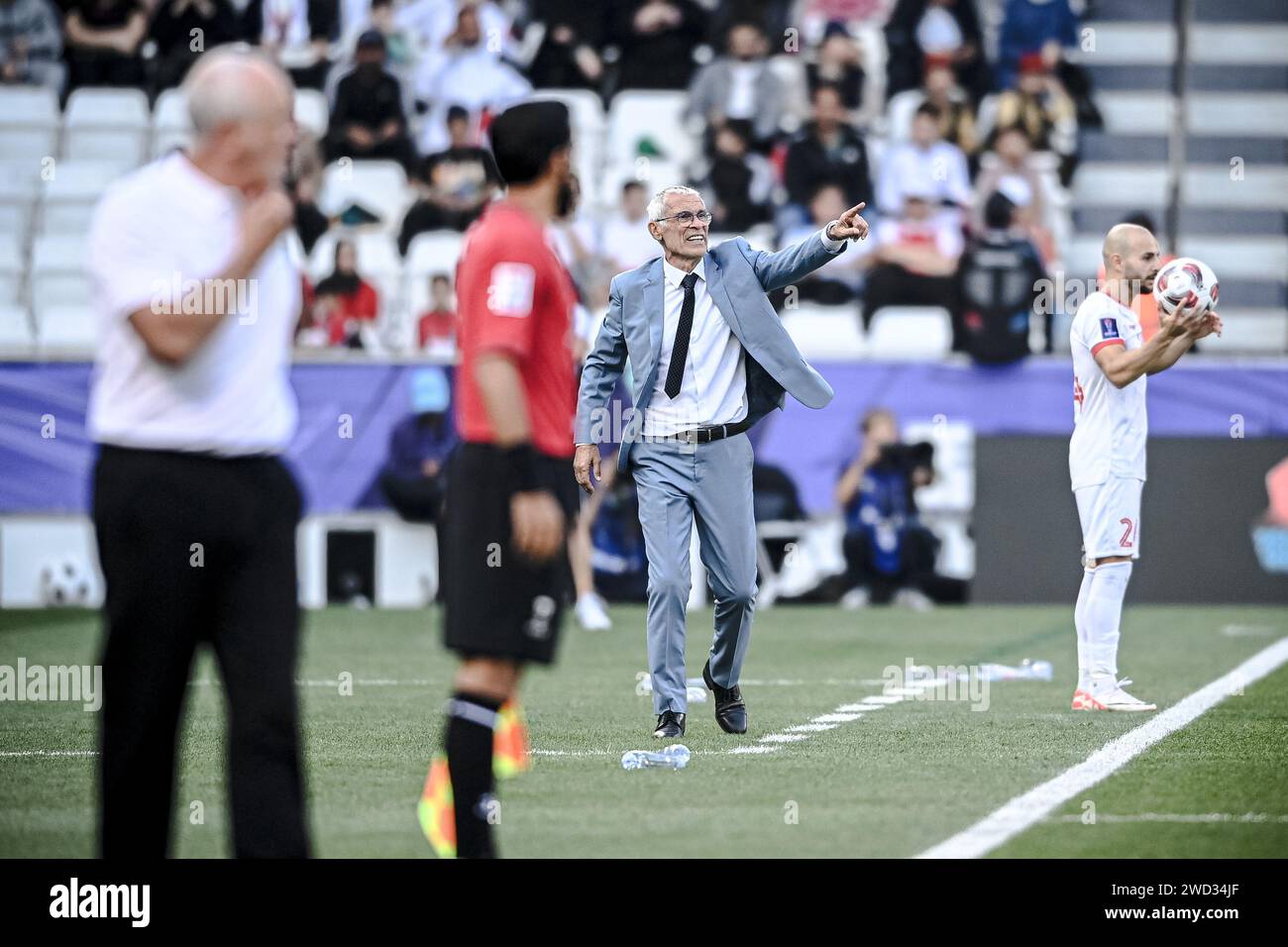 Doha, Qatar. 18th Jan, 2024. Syria's head coach Hector Cuper (2nd R ...