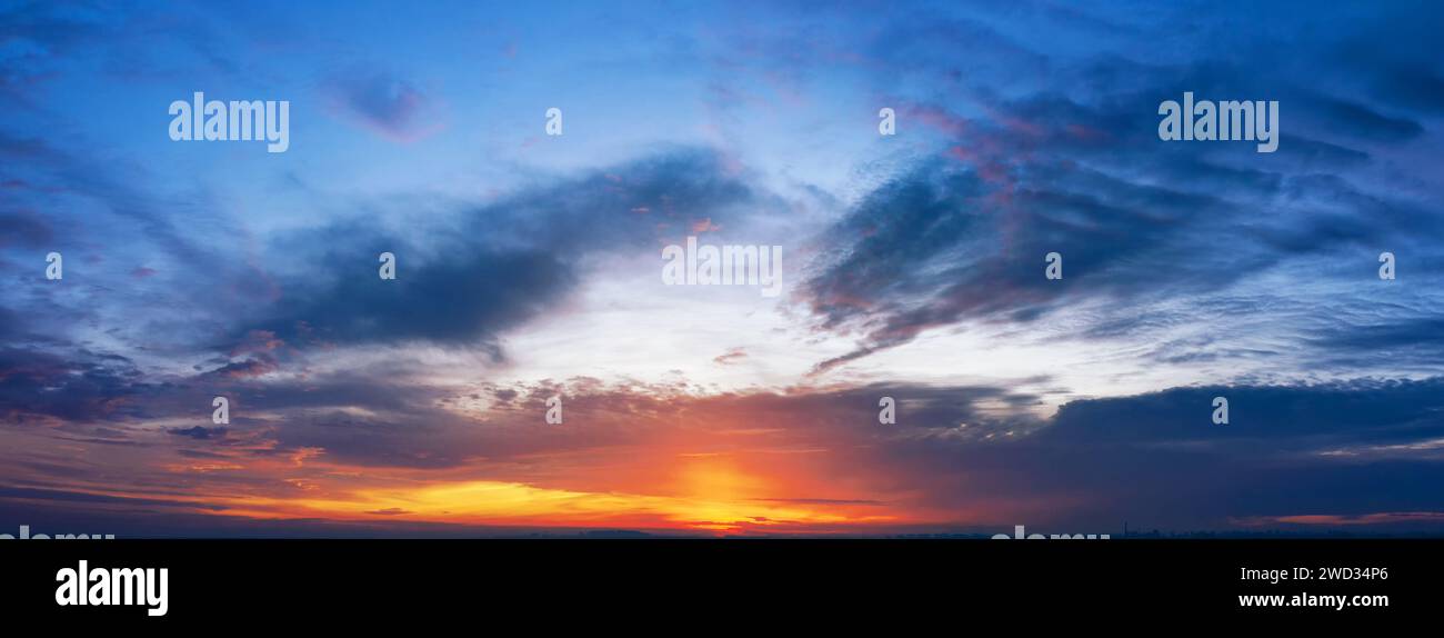 Dramatic sunset sky with clouds. Panorama Stock Photo - Alamy