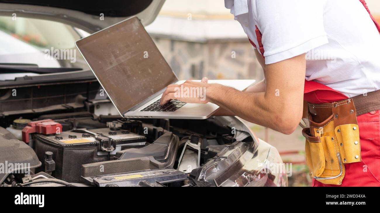 Diagnostic machine tools ready to be used with car Stock Photo - Alamy
