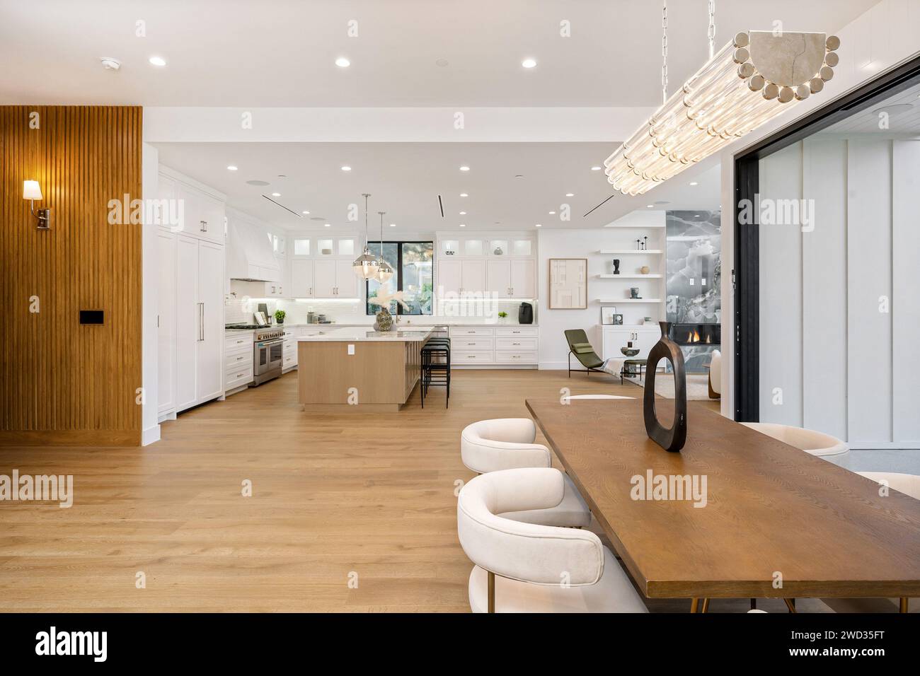 Open concept kitchen with dining area and bar in a modern home Stock ...