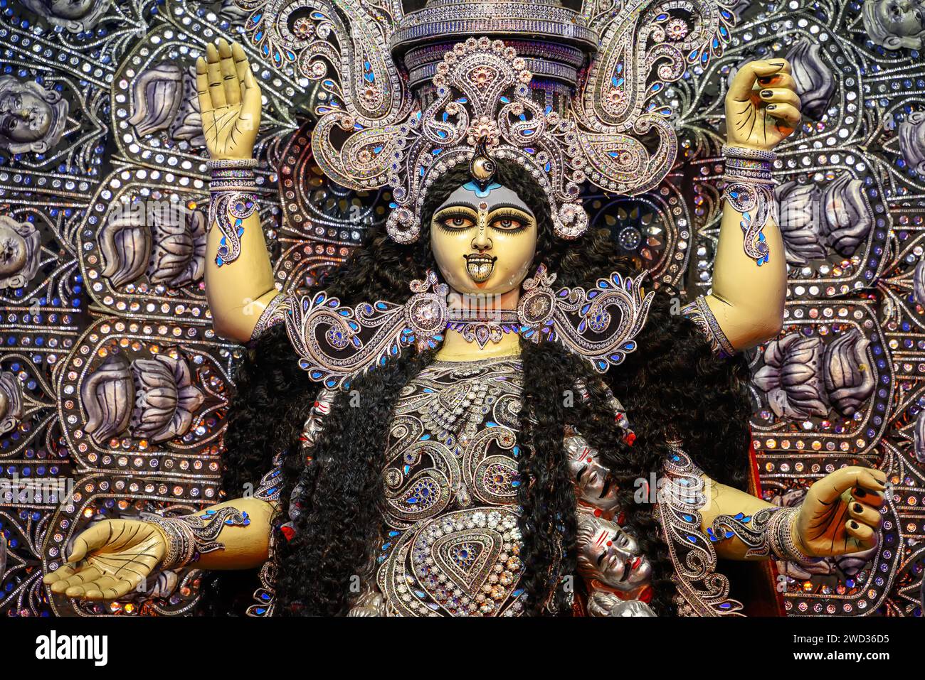 Idol of Goddess Maa Kali at a decorated puja pandal in Kolkata, West Bengal, India. Kali puja ...