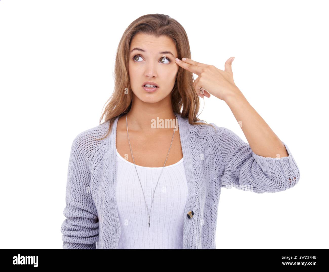 Face, bored and woman with hand gun in studio for self harm, gesture or ...