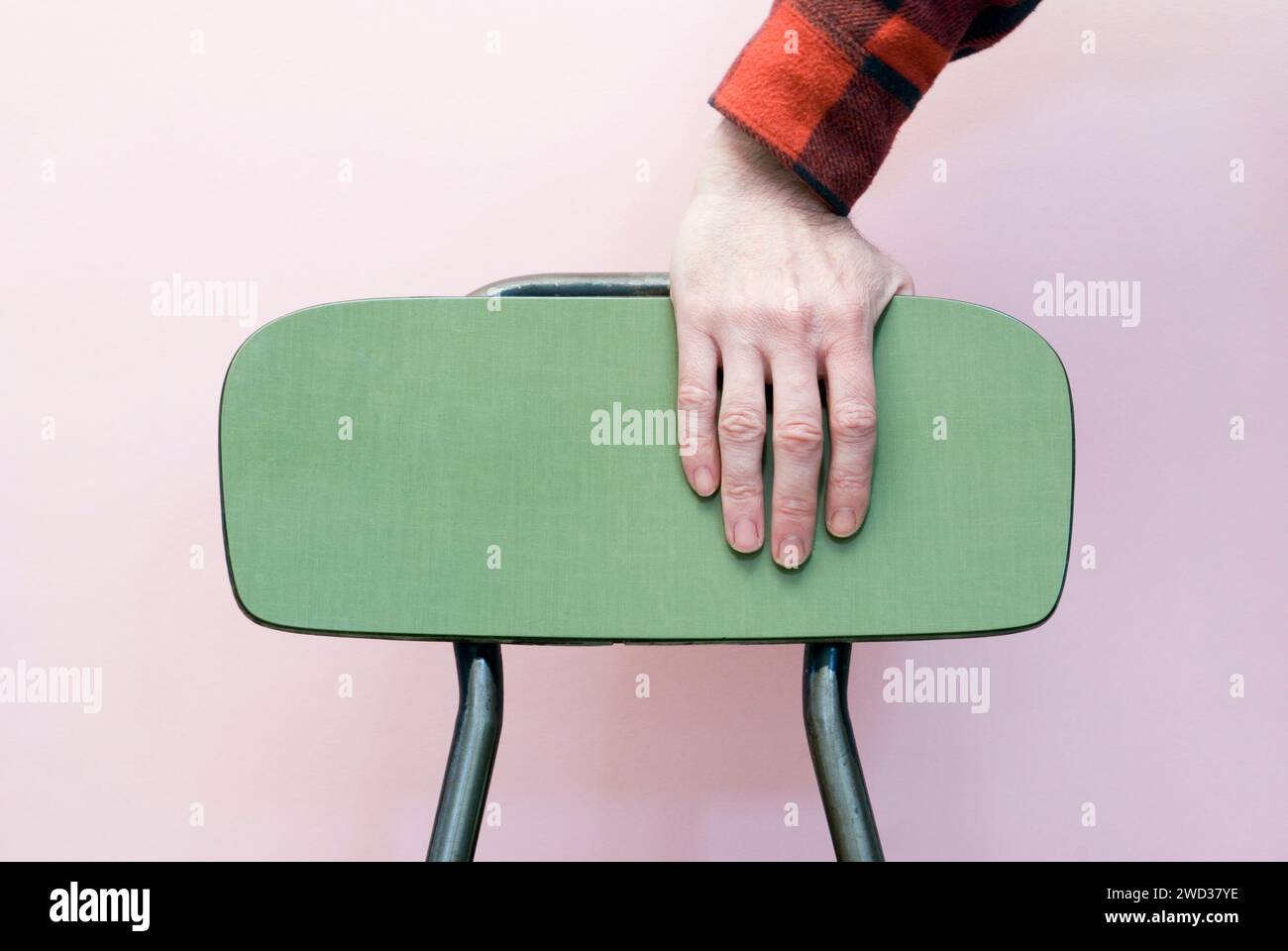 hand on vintage chair Stock Photo - Alamy
