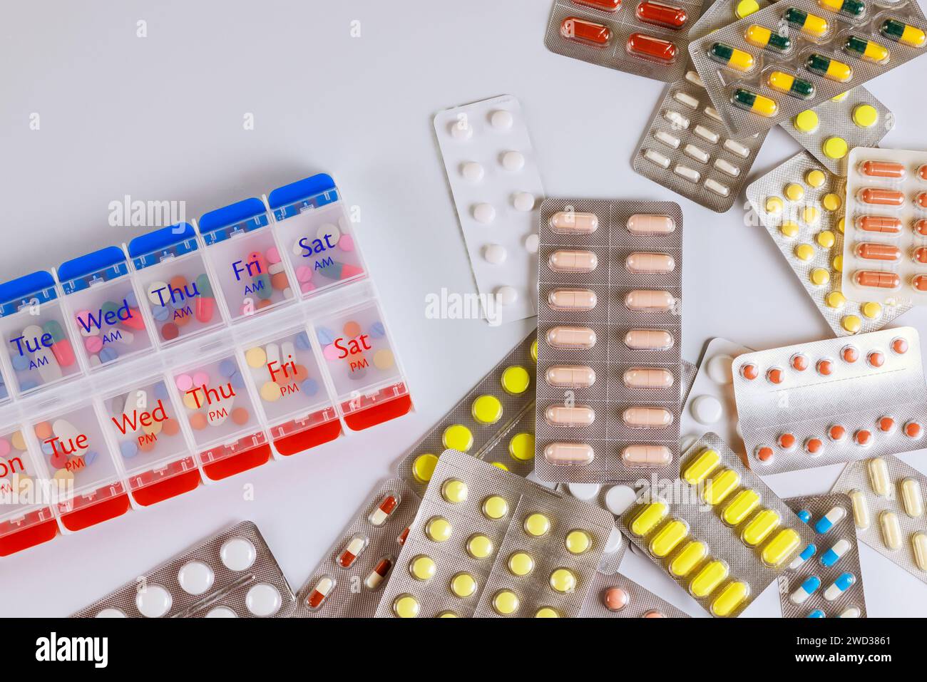 Weekly organizer dispenser is used for distribution pills, tablets ...