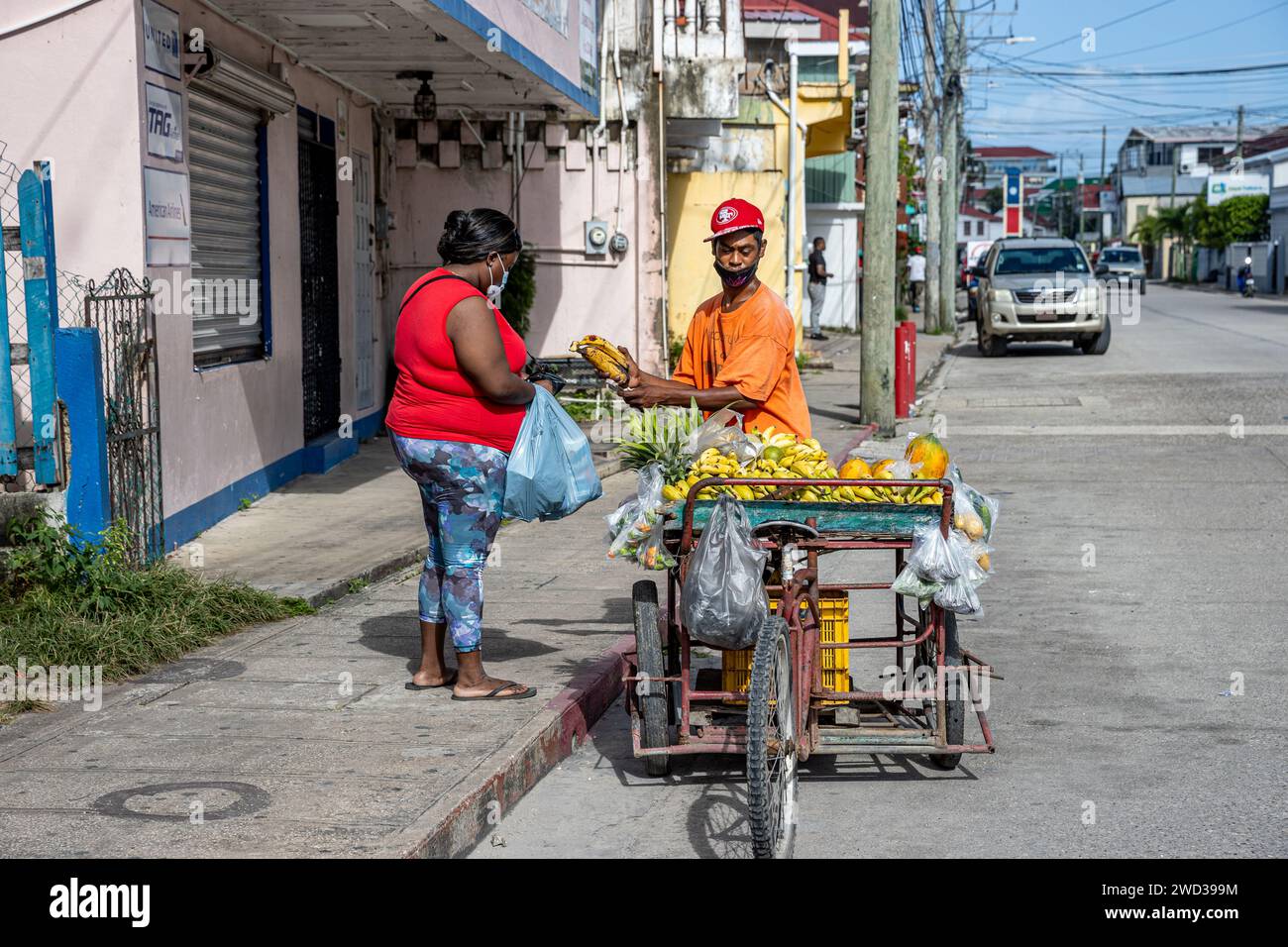Belize, Belize City, Street scene, Peddler of fruit Stock Photo - Alamy