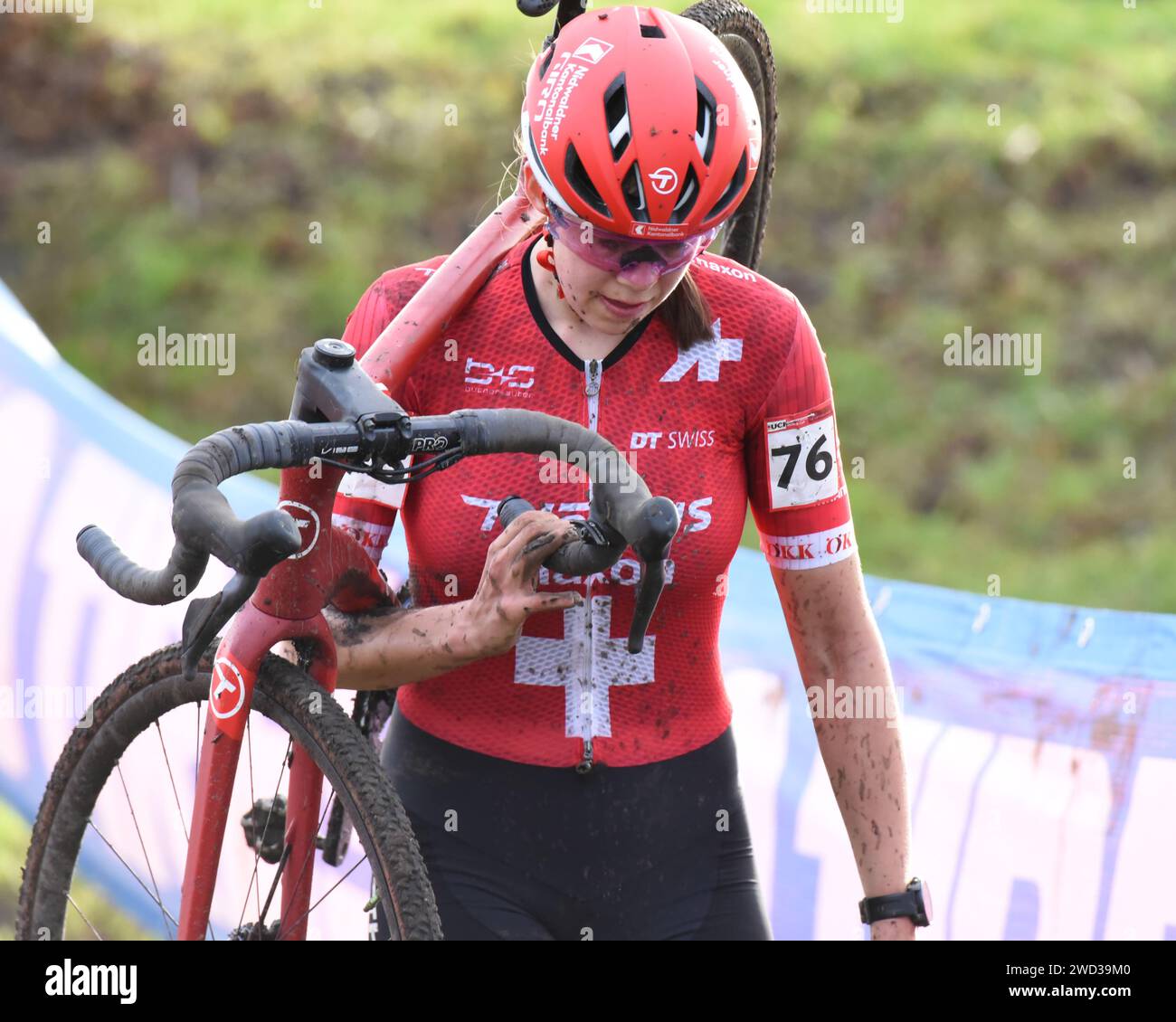 Swiss champion Alessandra Keller had to shoulder her broken-down bike ...