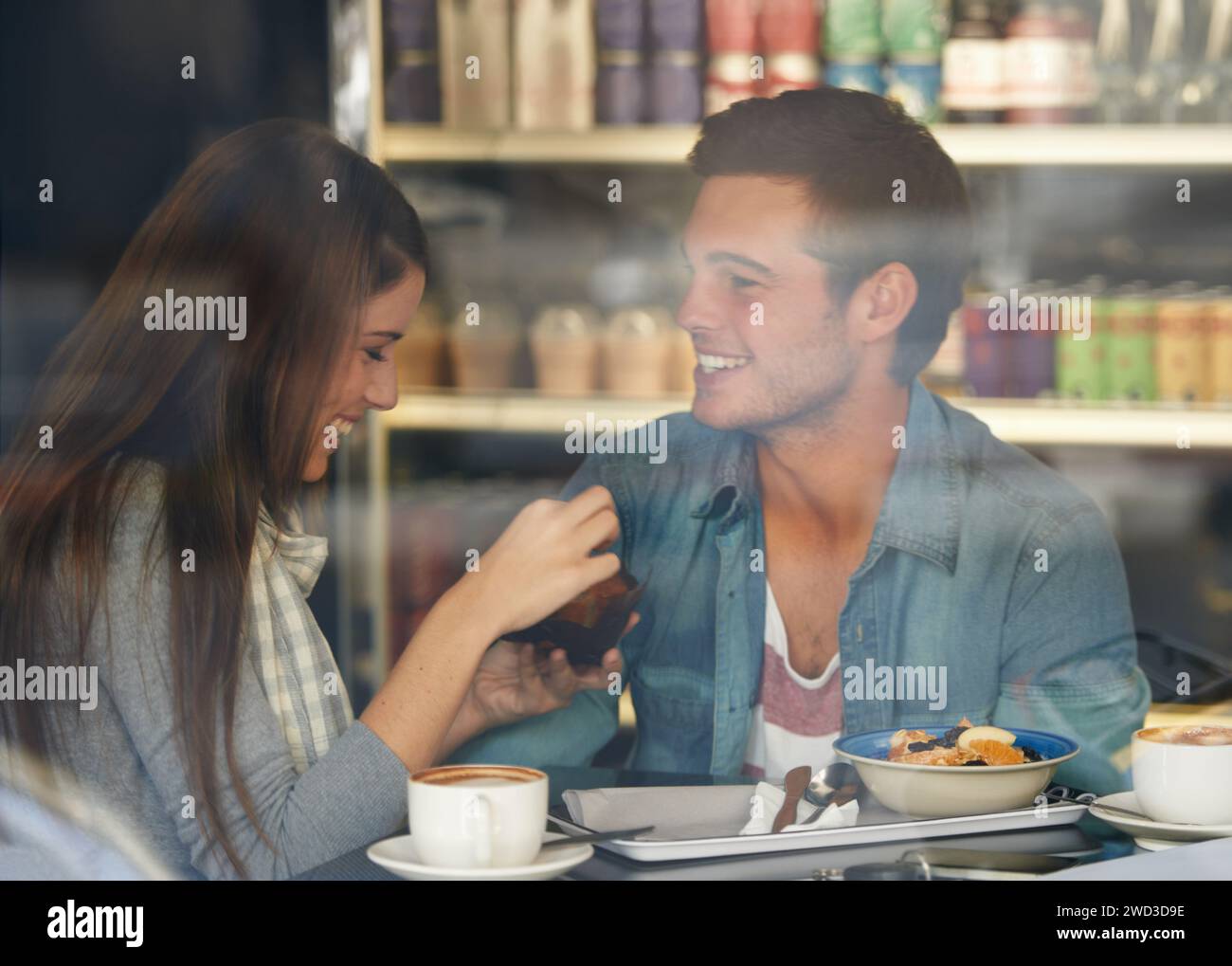 Food, smile and couple eating in cafe, care and bonding together on ...