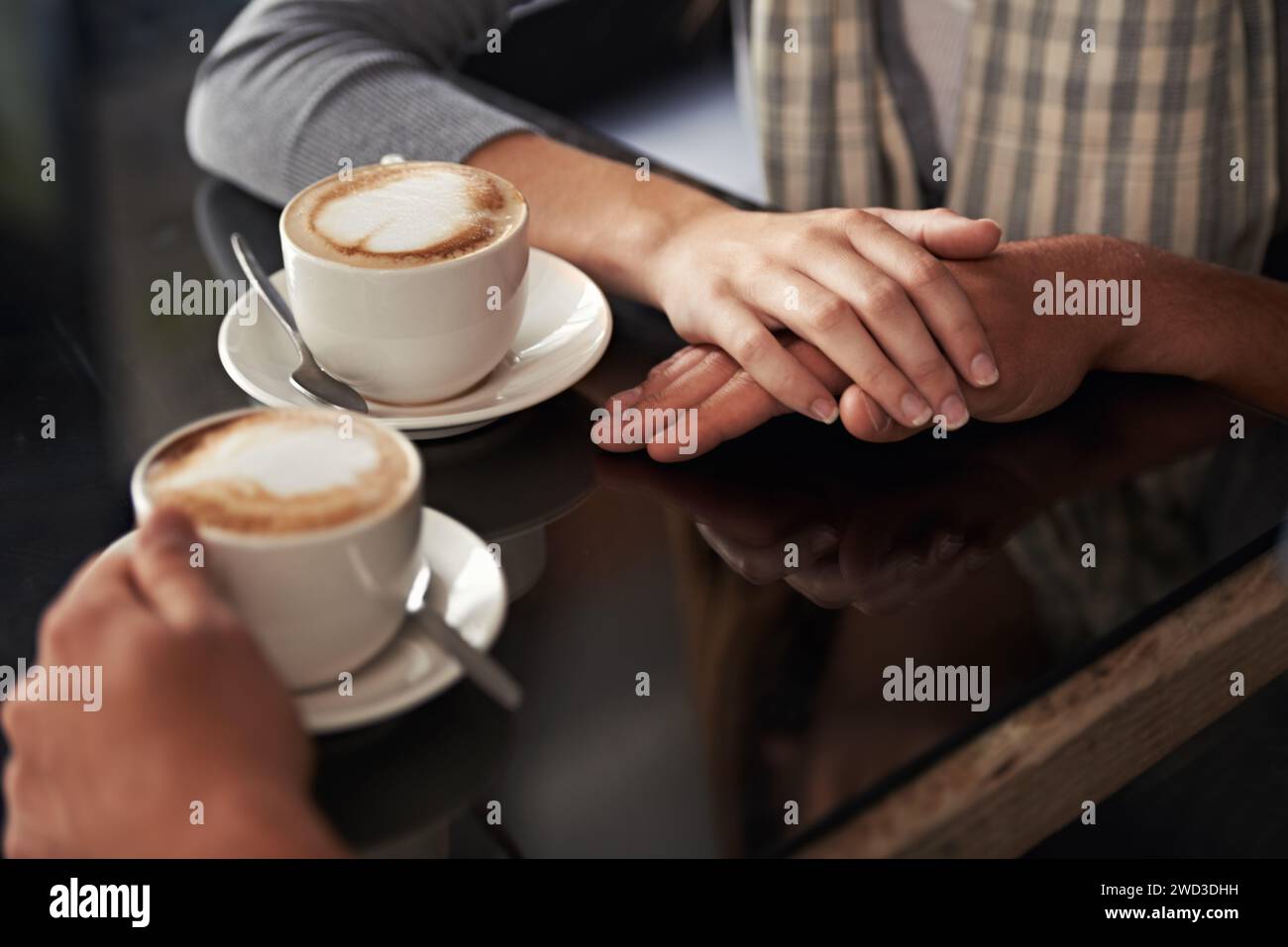 Coffee cup, cafe and relax couple holding hands for support, empathy ...