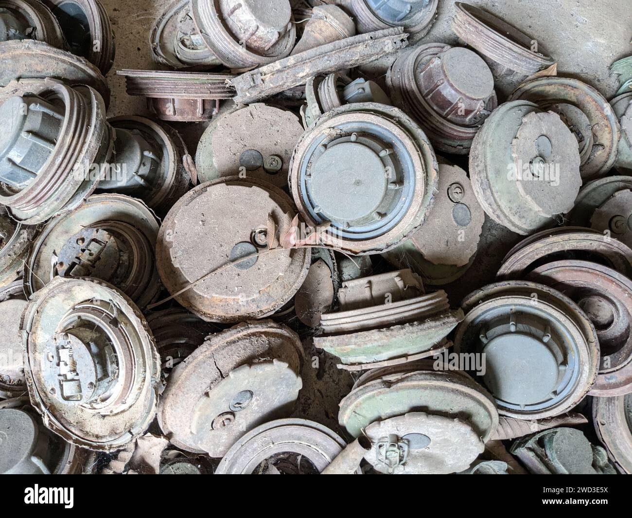 unexploded land mines and cluster bombs remains picked up all around ...