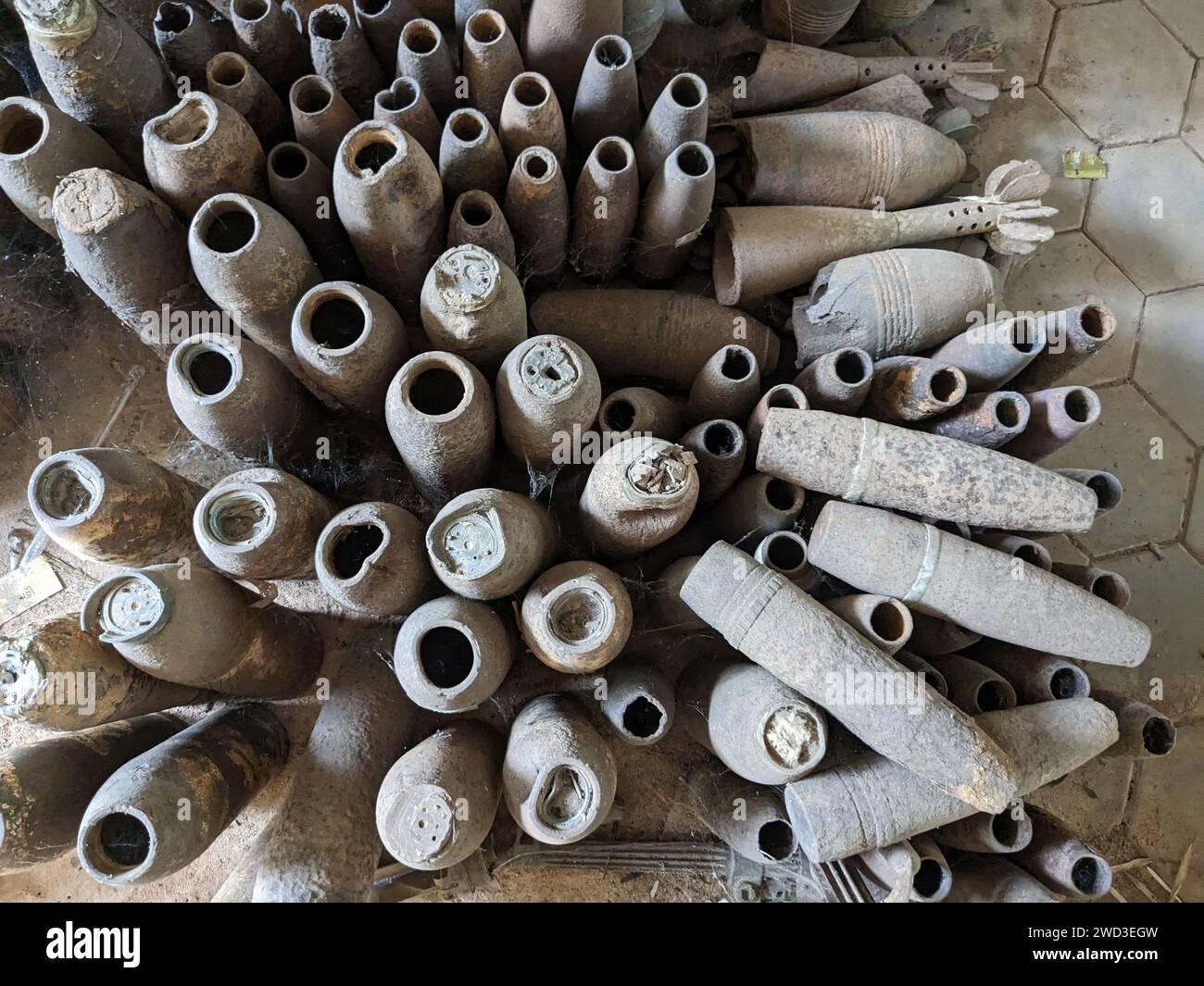 unexploded land mines and cluster bombs remains picked up all around ...