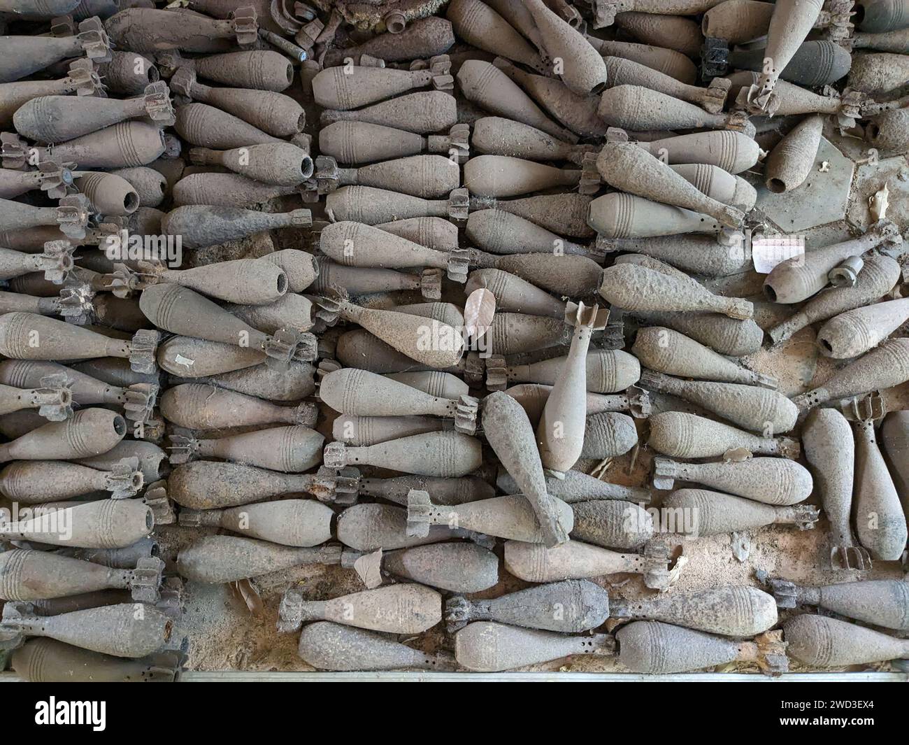 unexploded land mines and cluster bombs remains picked up all around ...