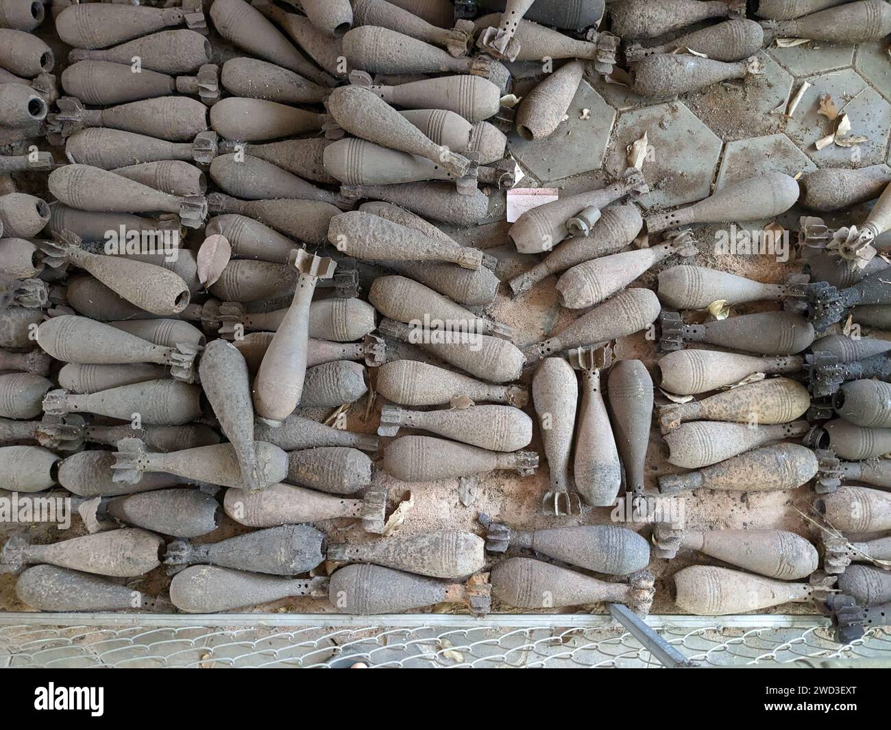 unexploded land mines and cluster bombs remains picked up all around ...