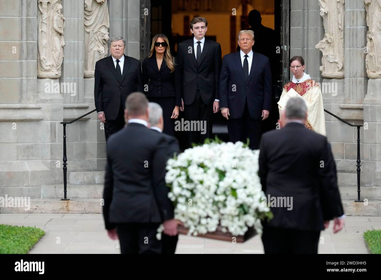 Former President Donald Trump, center right, stands with his wife ...