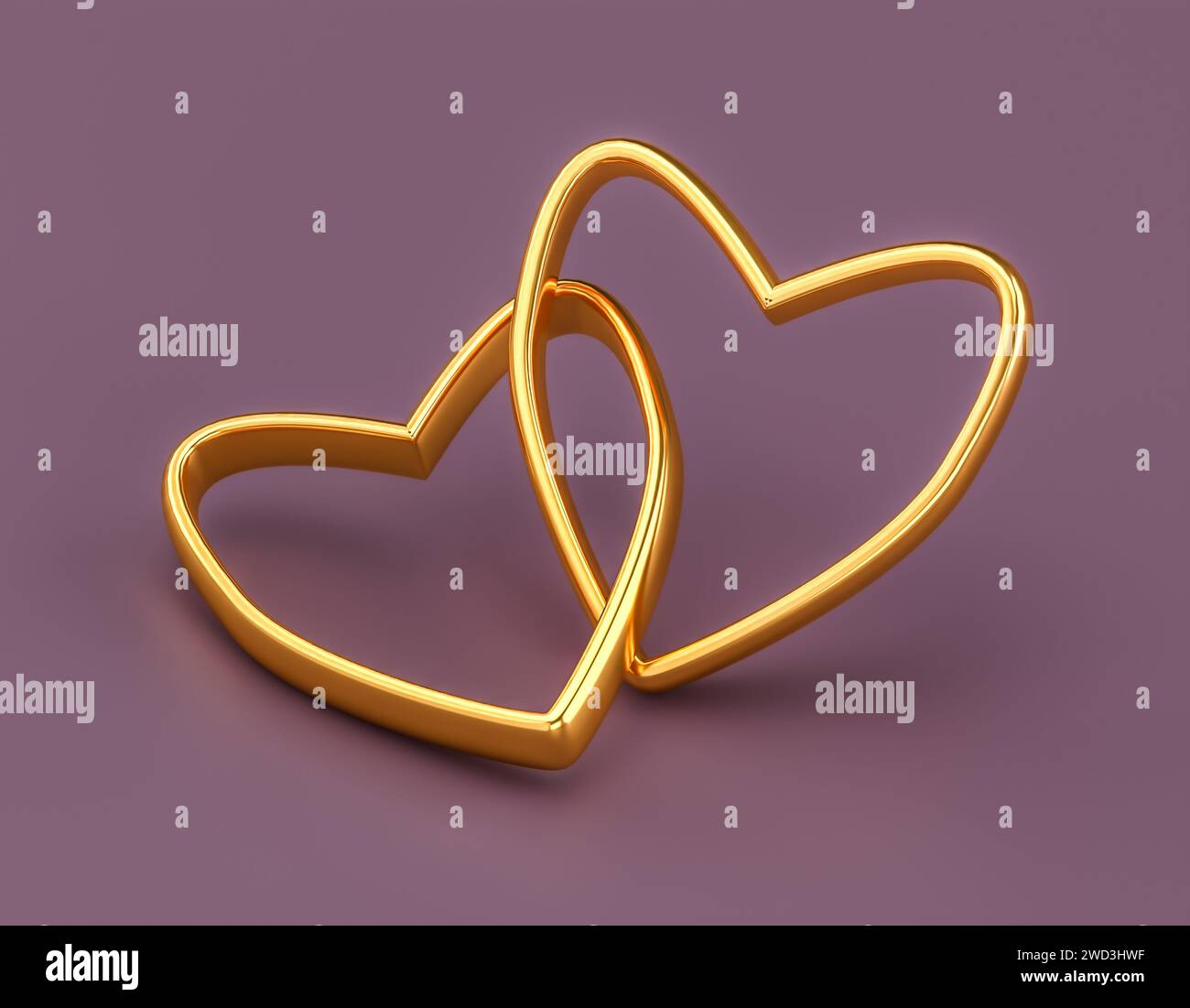 Gold wedding rings forming a heart, symbolizing love. Two golden rings ...