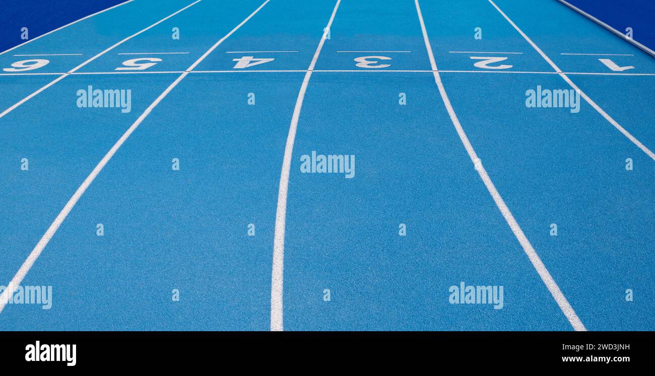 Olympic track lanes with white stripes and start and finish numbers ...