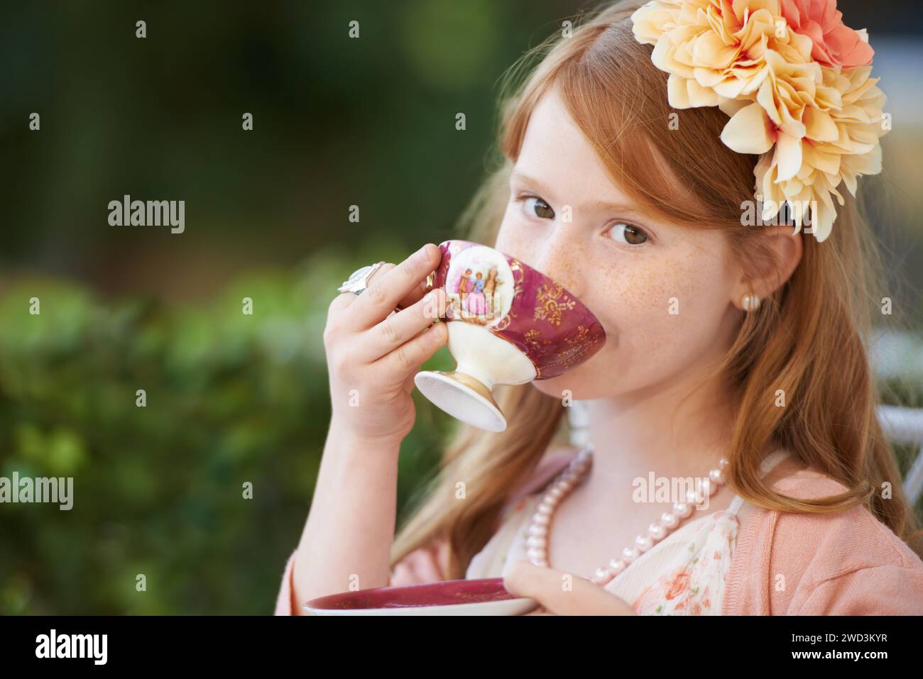 Girl, child and portrait of drinking tea in garden with party for ...