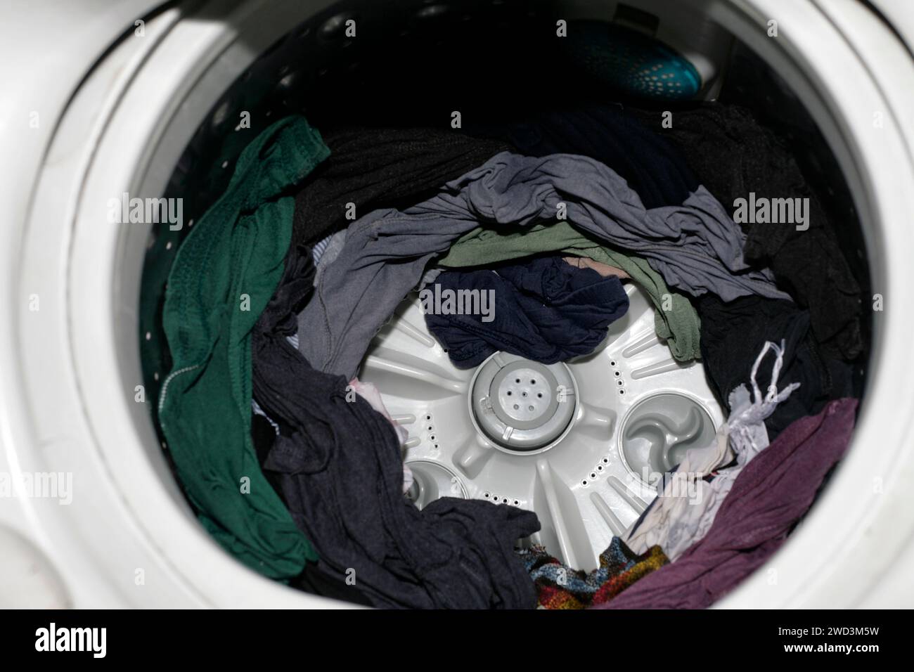 Laundry clothes with washing machine Stock Photo - Alamy