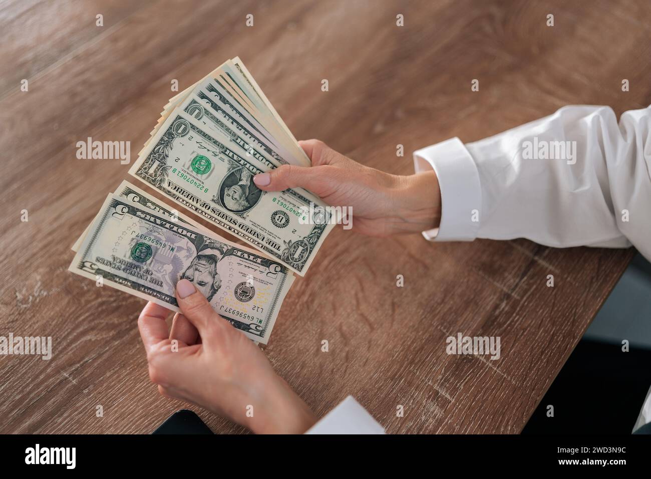 Closeup top view of successful female counting money. Close-up of ...