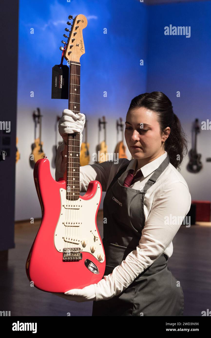 LONDON, UNITED KINGDOM - JANUARY 18, 2023: A staff member holds Fender ...