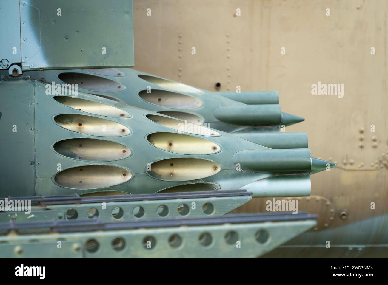 Old Soviet-made camouflage Mi-24 military helicopter rocket pods Stock ...