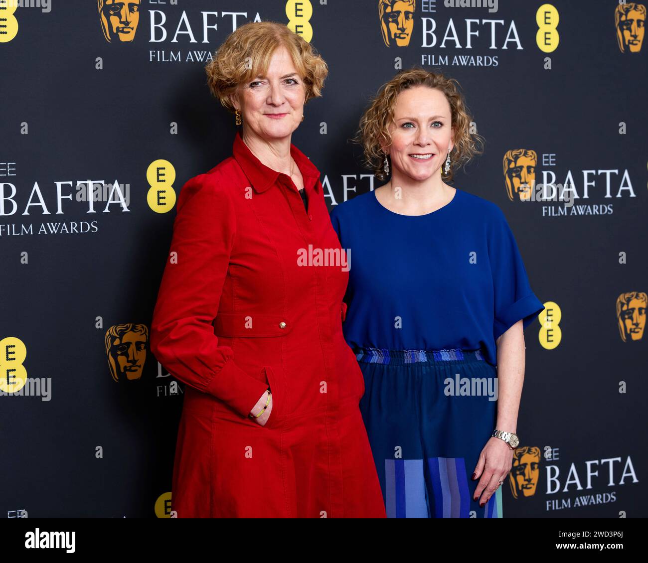 Sara Putt, left, and Anna Higgs pose for photographers following the ...