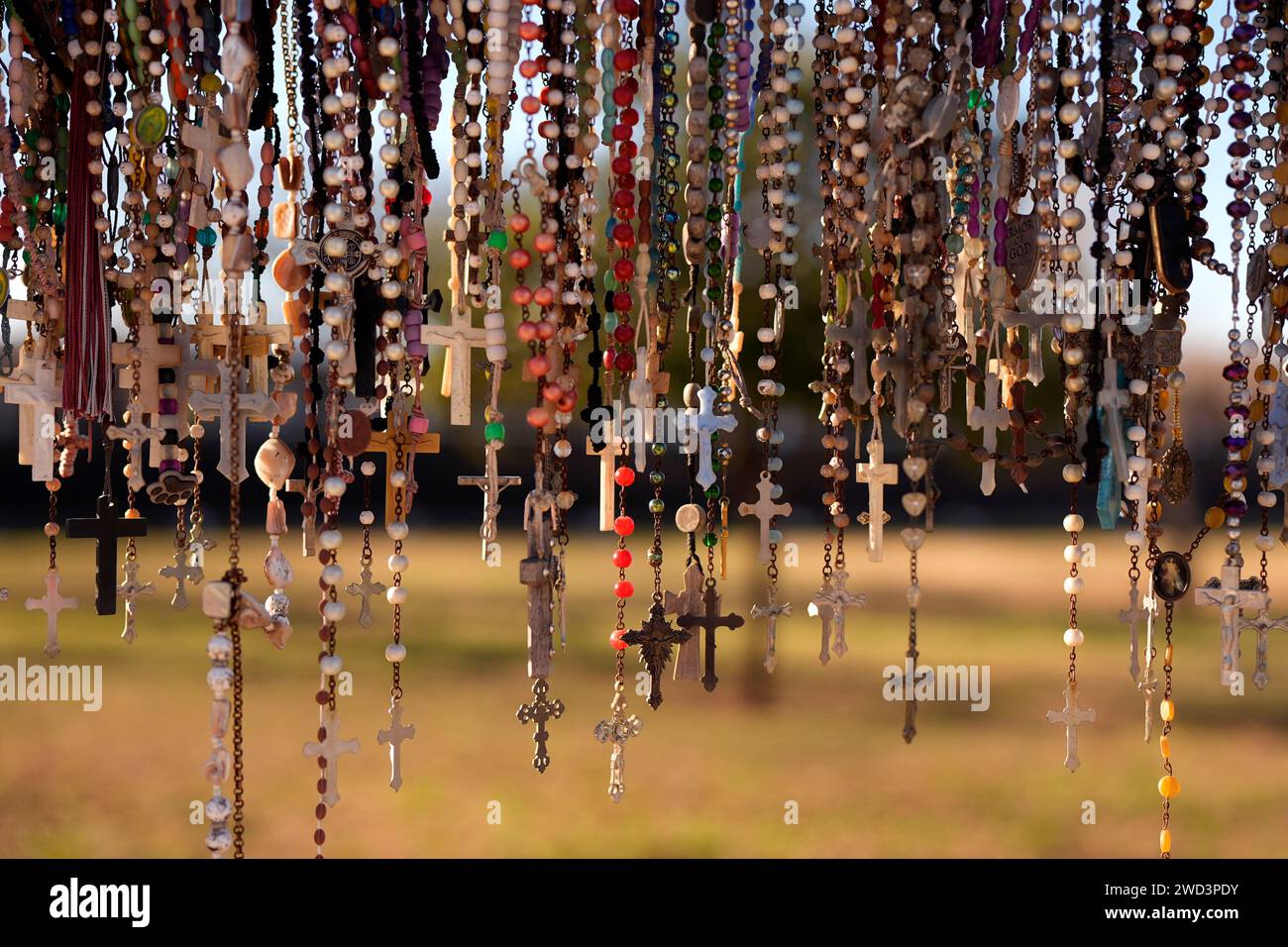 Crosses and rosaries hang in front of Robb Elementary in memorial to ...