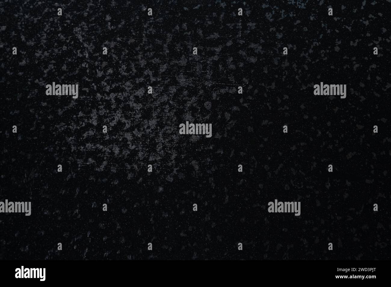 Black plastic pattern background with wear spots close up view Stock ...