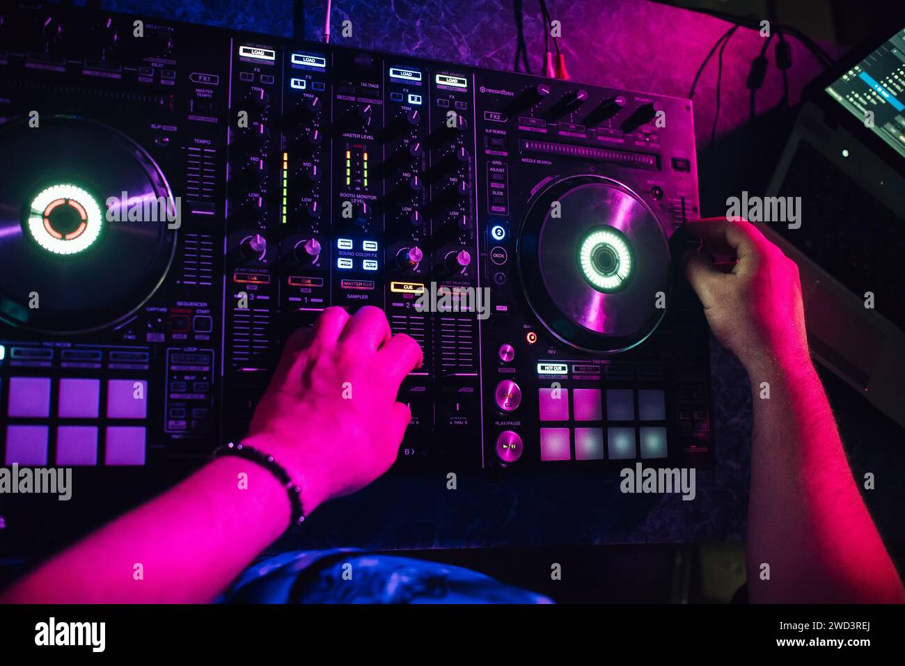 Hands dj plays music hi-res stock photography and images - Alamy