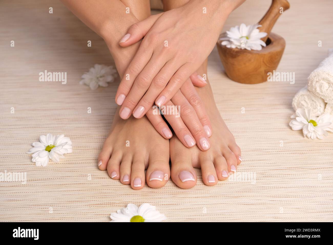 The picture of ideal done manicure and pedicure. Female hands and legs ...