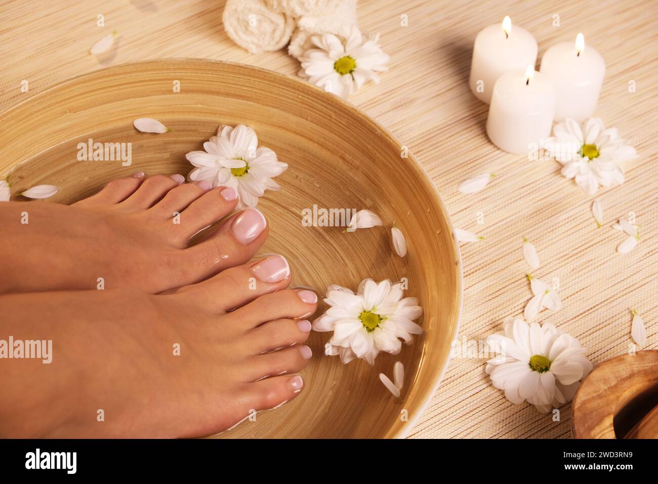 The picture of ideal done manicure and pedicure. Female hands and legs ...