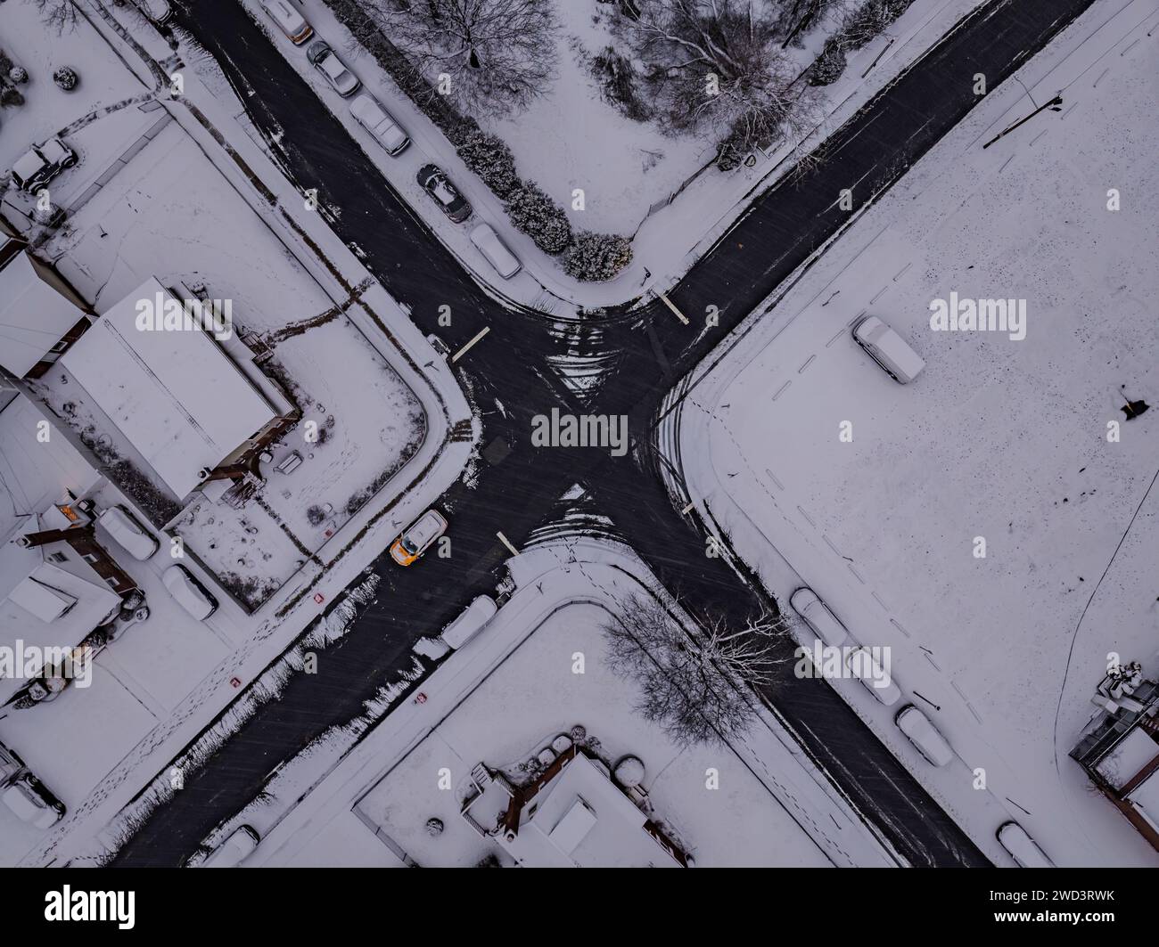 An aerial view over a residential neighborhood intersection on Long ...