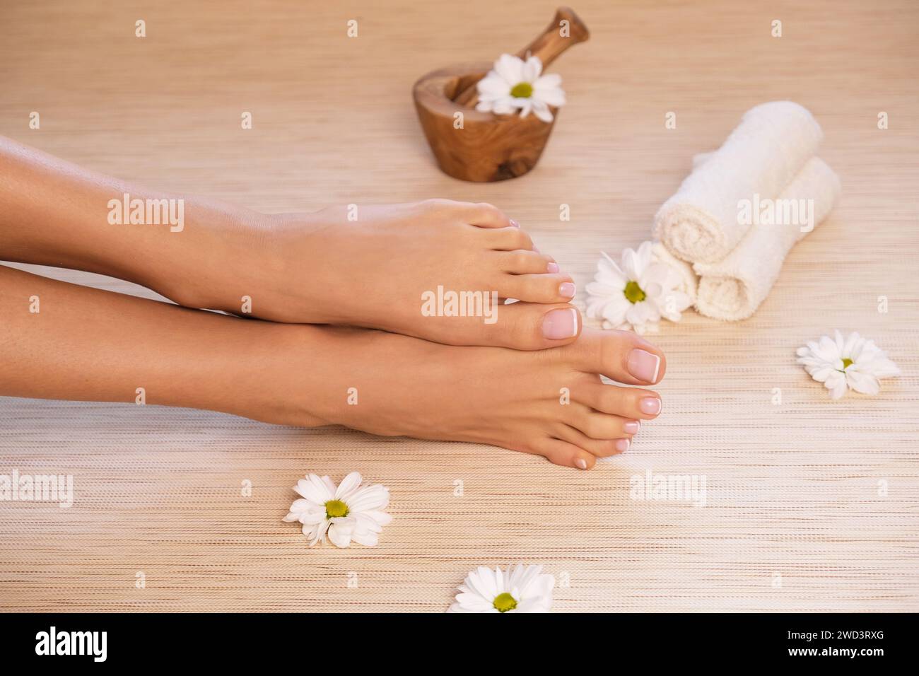 The picture of ideal done manicure and pedicure. Female hands and legs ...