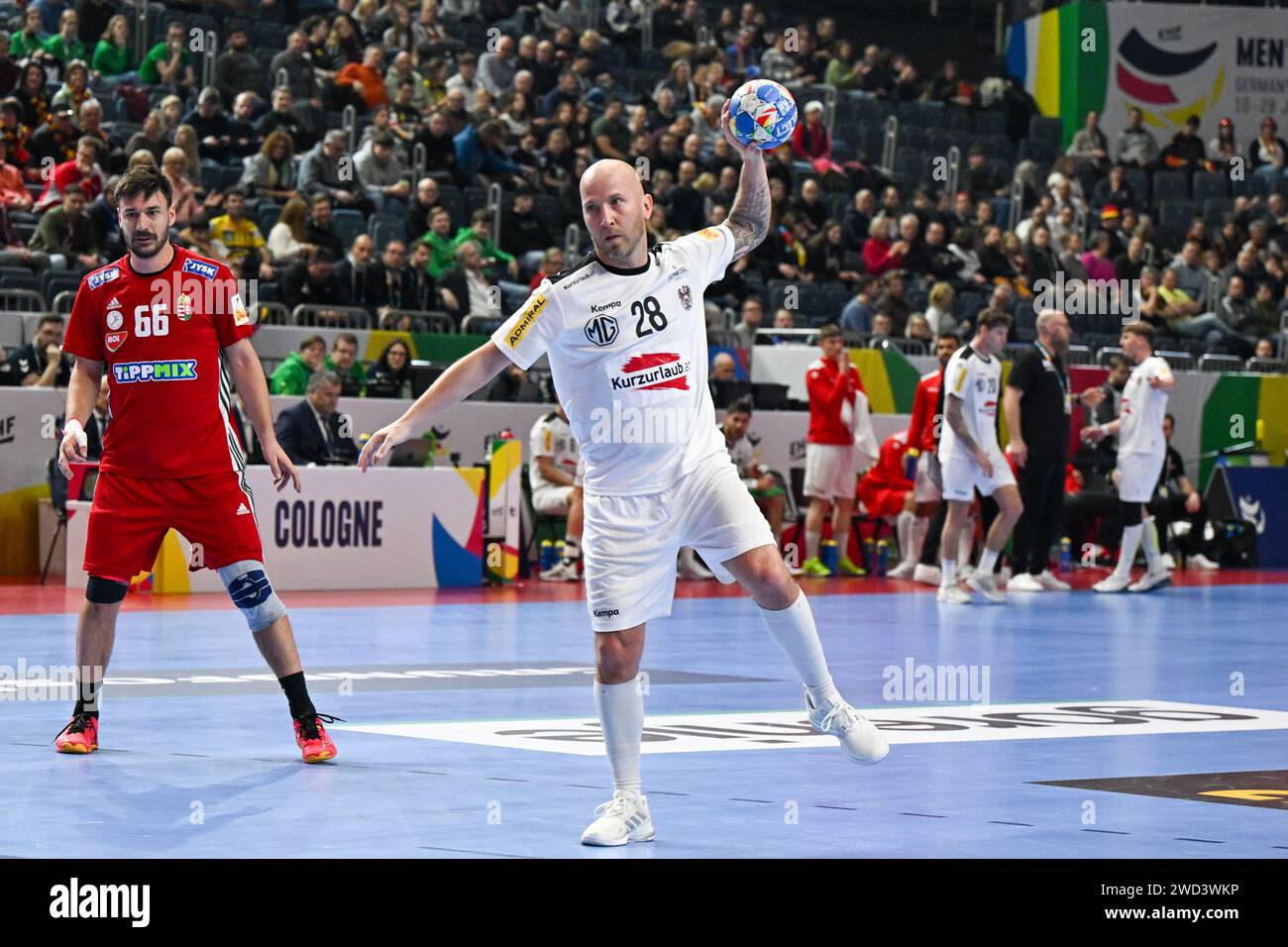 Cologne, Germany. 18th Jan, 2024. 7mt. throw Robert Weber (Austria ...