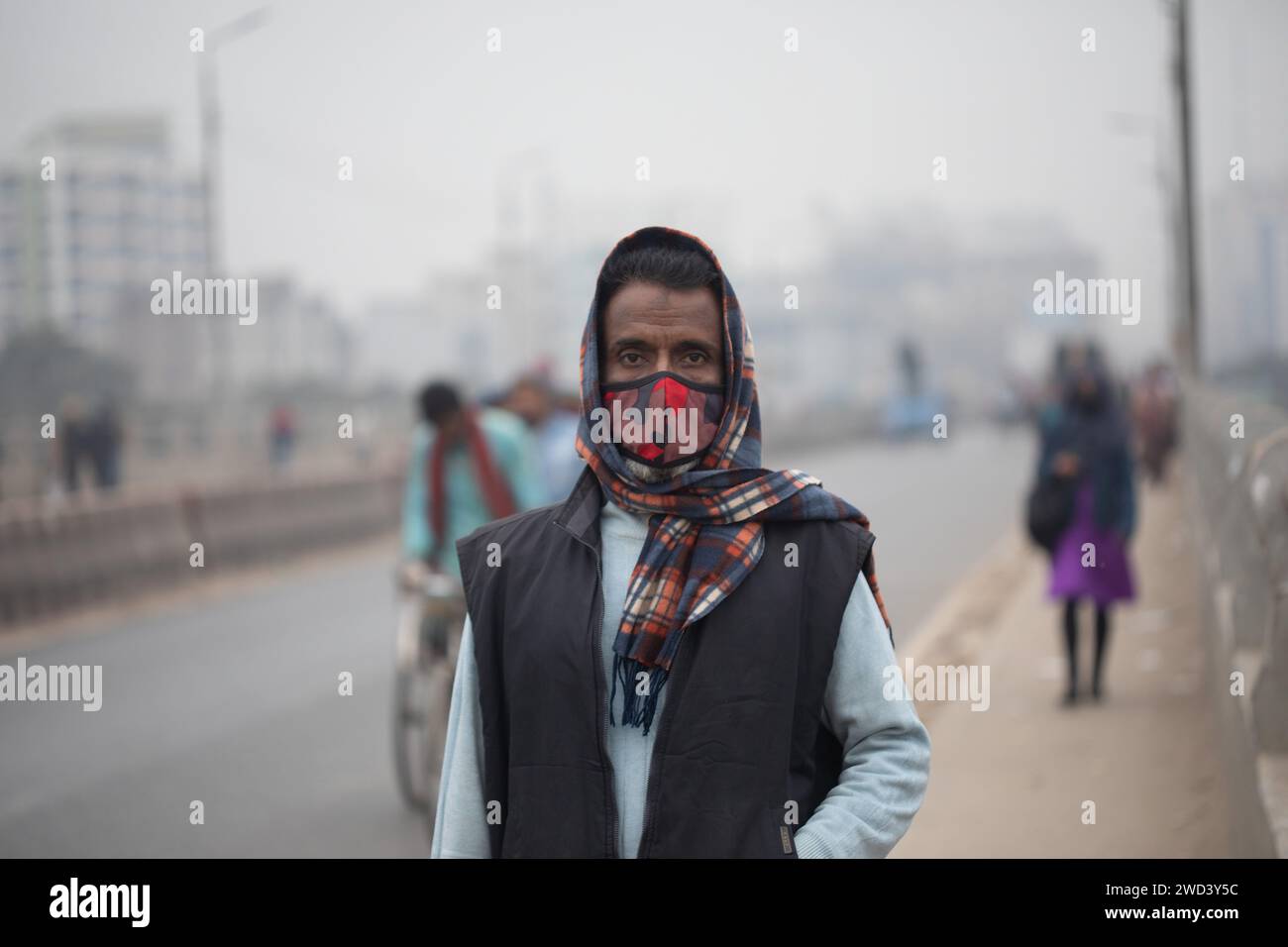 Dhaka, Bangladesh. 18th Jan, 2024. A man seen walking in Sadarghat ...