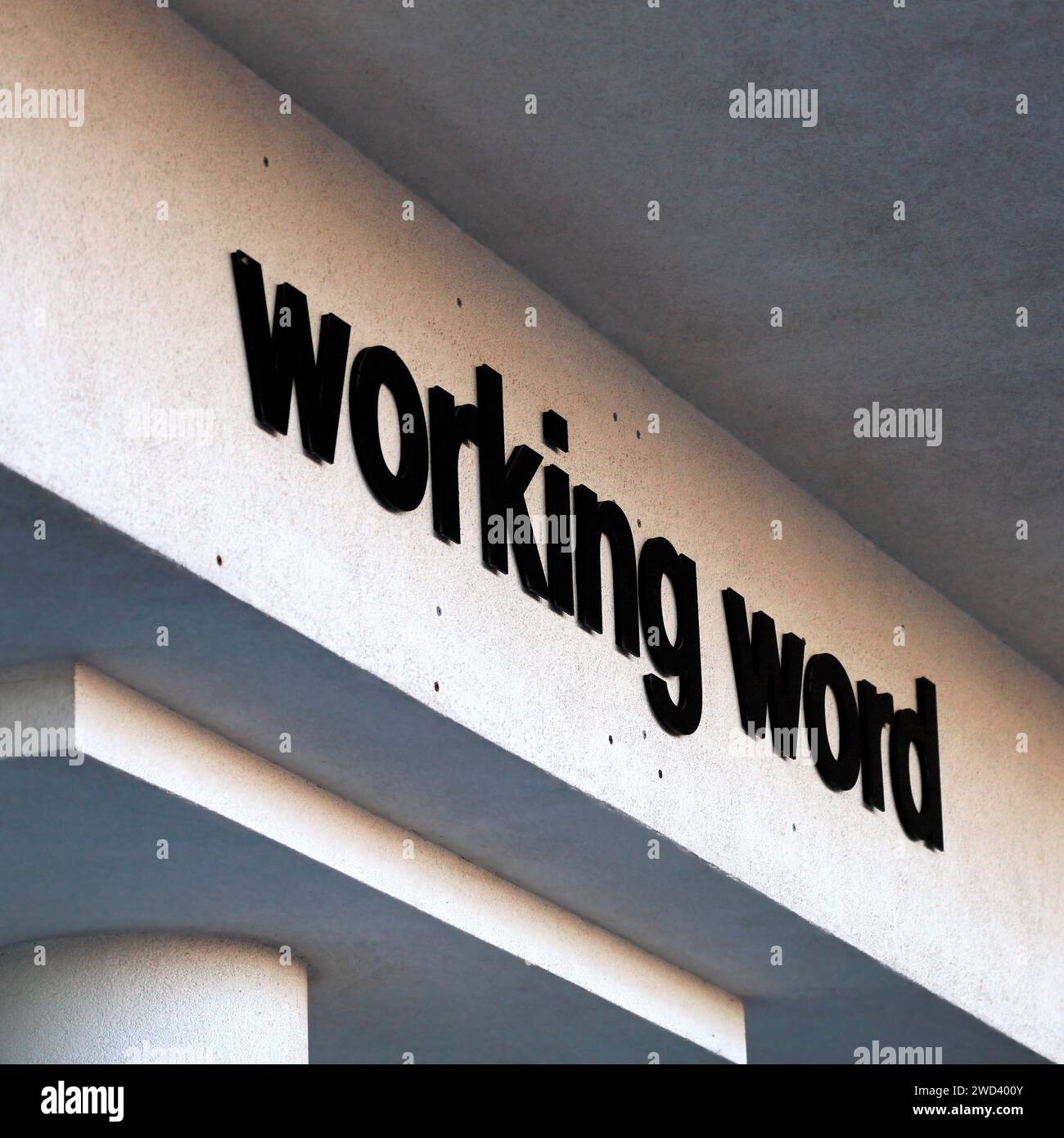 Working Word sign over a doorway, Cardiff Bay, Taken January 2024 Stock ...