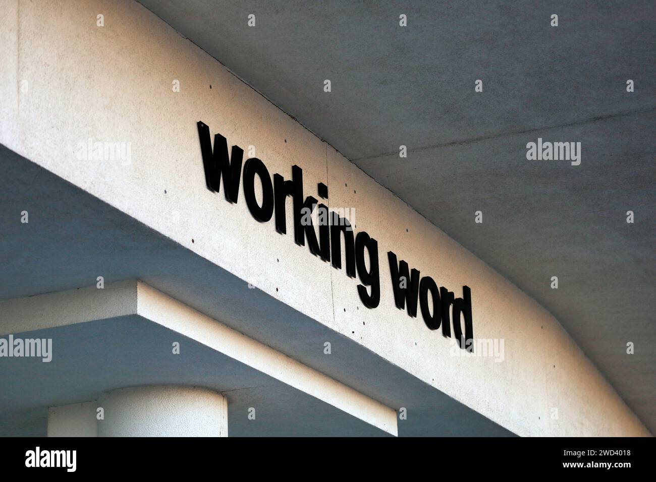 Working Word sign over a doorway, Cardiff Bay, Taken January 2024 Stock ...
