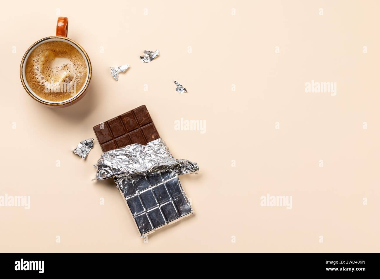 Coffee break bliss: Chocolate bar paired with a cup of coffee. Flat lay ...