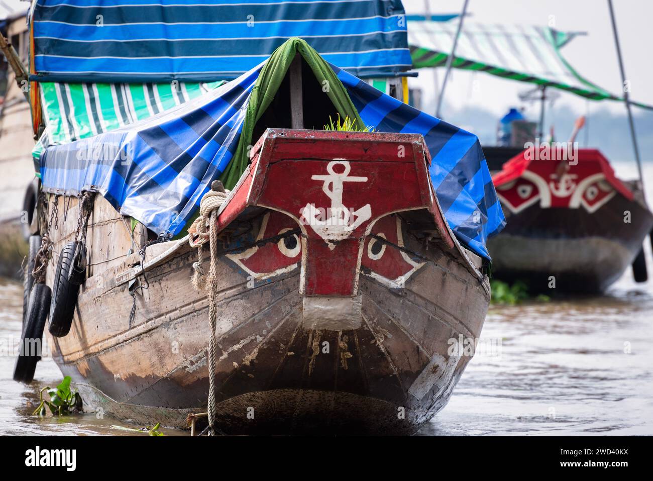 Vietnamese river boats with traditional painting - the eyes protect ...