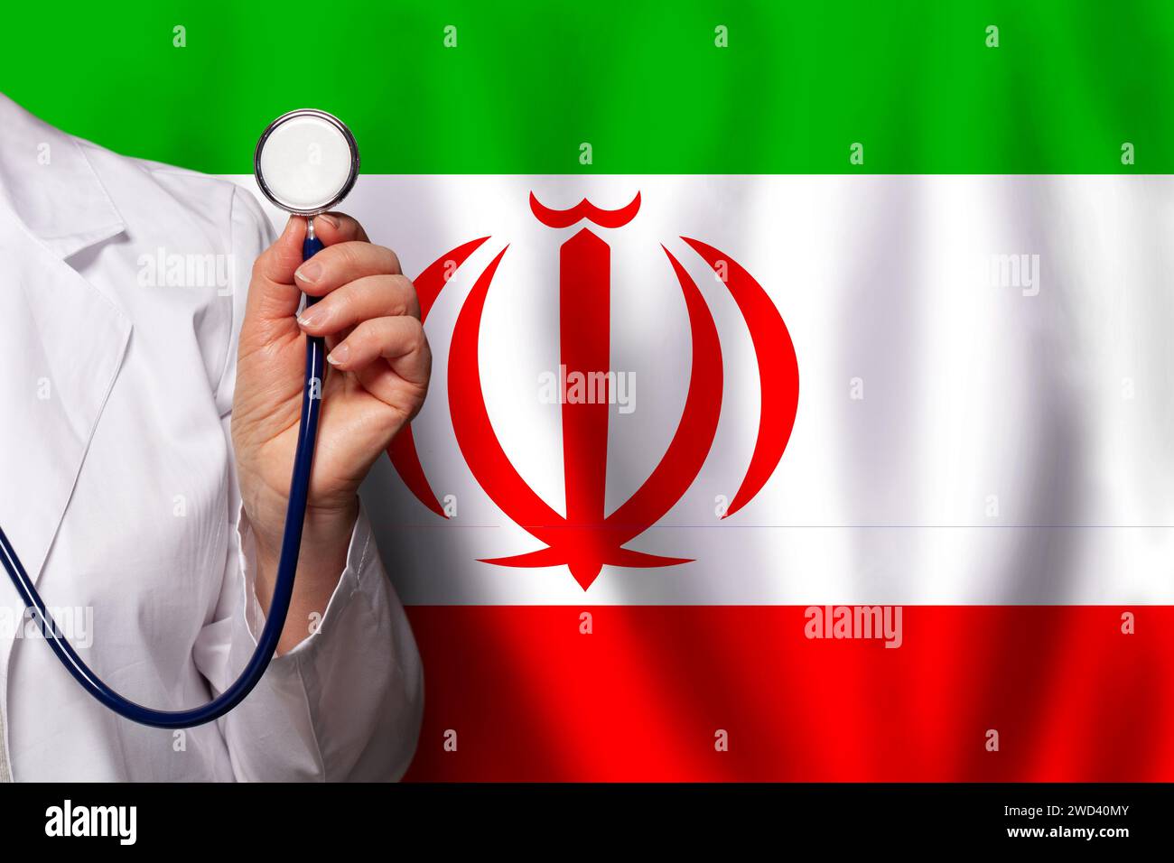 Irani doctor's hand with stethoscope on the background of flag of Iran ...