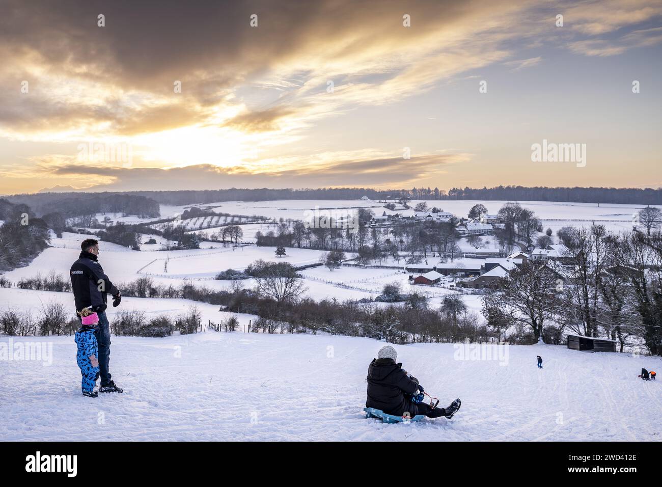 FILES - People enjoy outside in the snow. There is a thick layer of ...