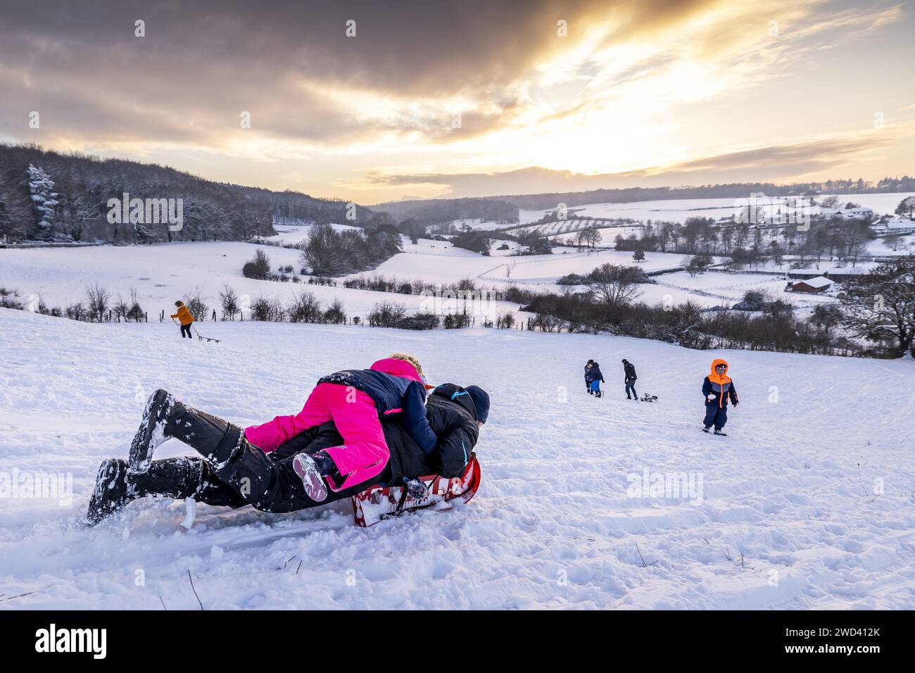 FILES - People enjoy outside in the snow. There is a thick layer of ...