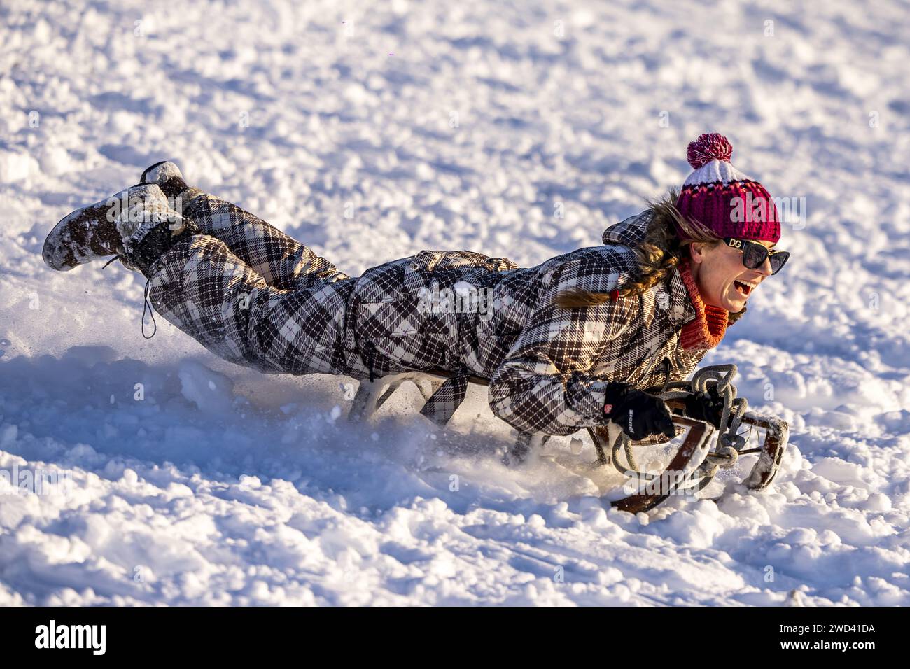FILES - People enjoy outside in the snow. There is a thick layer of ...