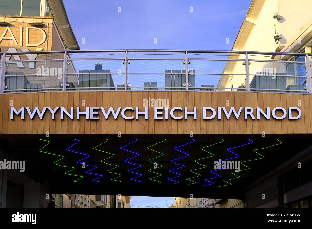 Mwynhewch Eich Diwrnod / Enjoy your day overhead sign in Welsh language ...