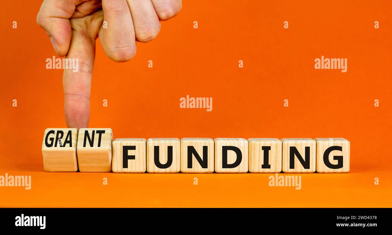 Grant funding symbol. Concept words Grant funding on beautiful wooden ...