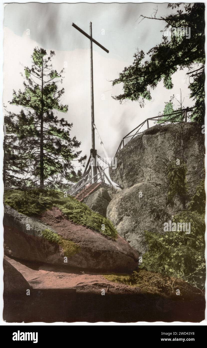 An antique postcard shows photo with a cross on top of Mount Liensburg ...