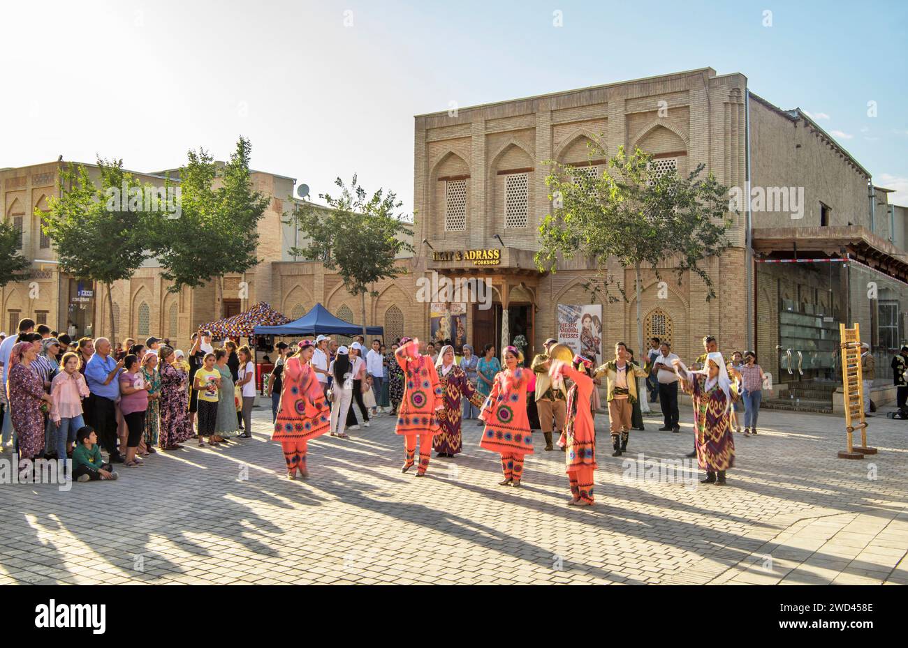 Dancing people at square in old Bukhara. Uzbekistan Stock Photo - Alamy