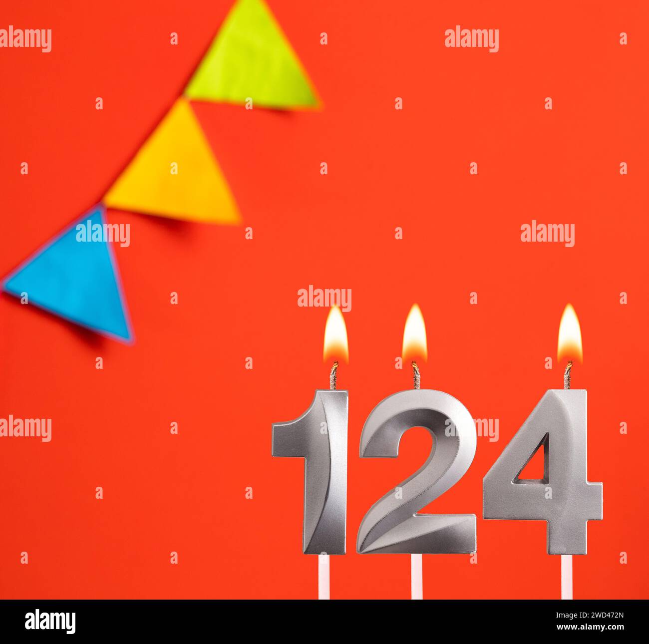 Birthday card - Number 124 candle in orange background Stock Photo - Alamy